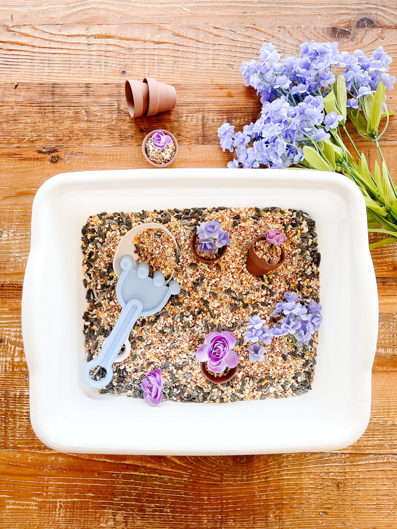 Spring Flower Garden Sensory Bin - Stickers and Stilettos